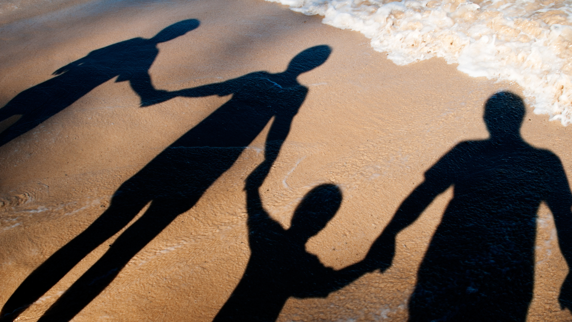 Shadow Of A Family With Two Teens